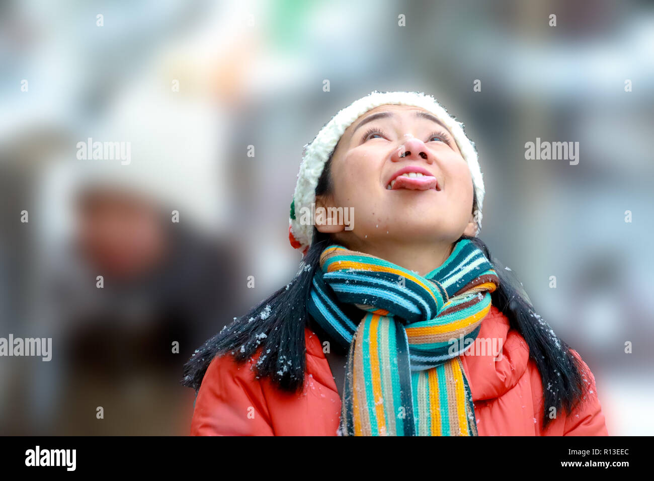 Girl catching snowflakes tongue hi-res stock photography and images - Alamy