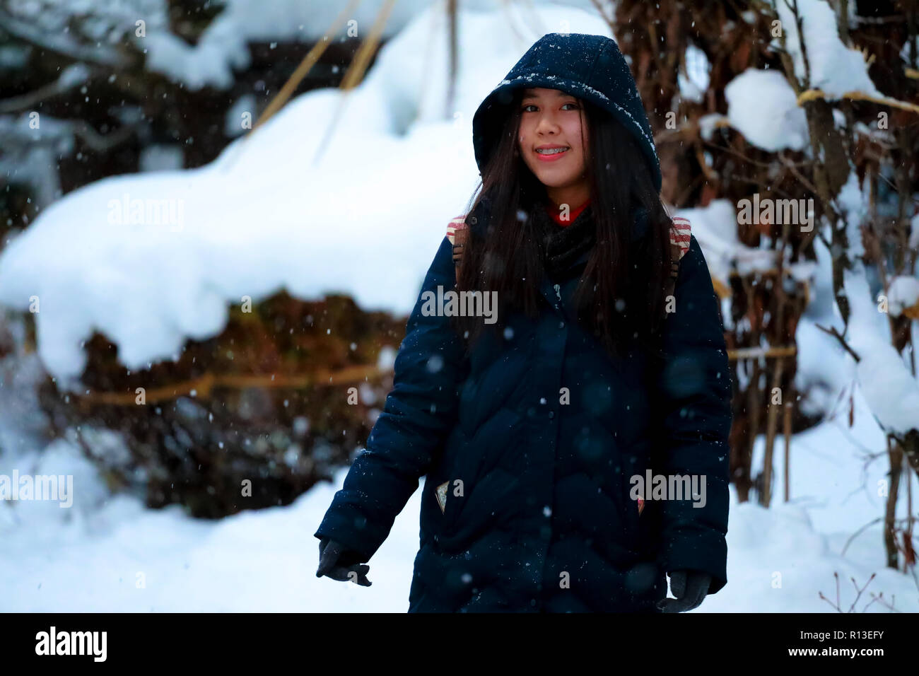 Girl on the snow hi-res stock photography and images - Alamy
