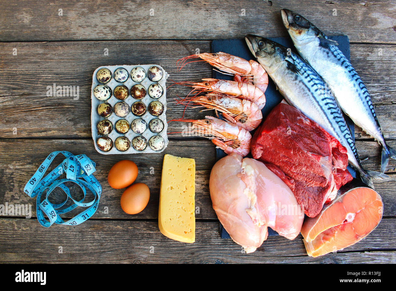 Healthy food of animal origin on old wooden background. Concept of ...