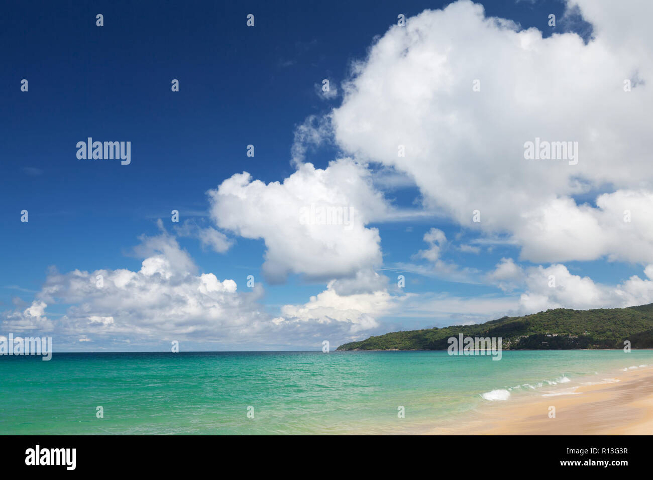 Tropical beach with bright sand and deep blue sea. Summer sea vacation ...