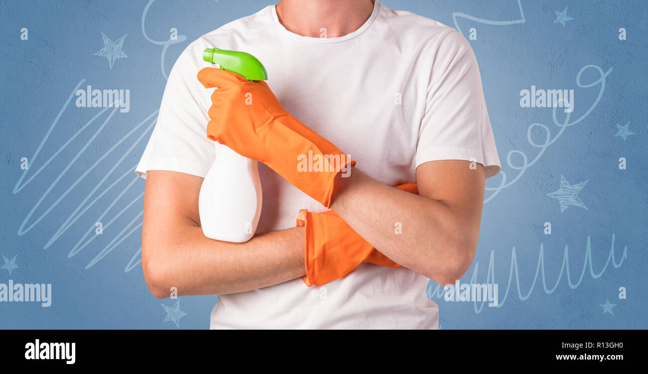 Swabber with orange rubber gloves and doodle concept on wallpaper Stock ...