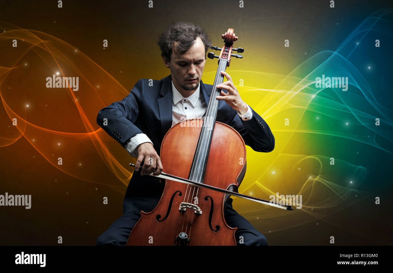 Serious classical cellist with fabled sparkling wallpaper Stock Photo ...