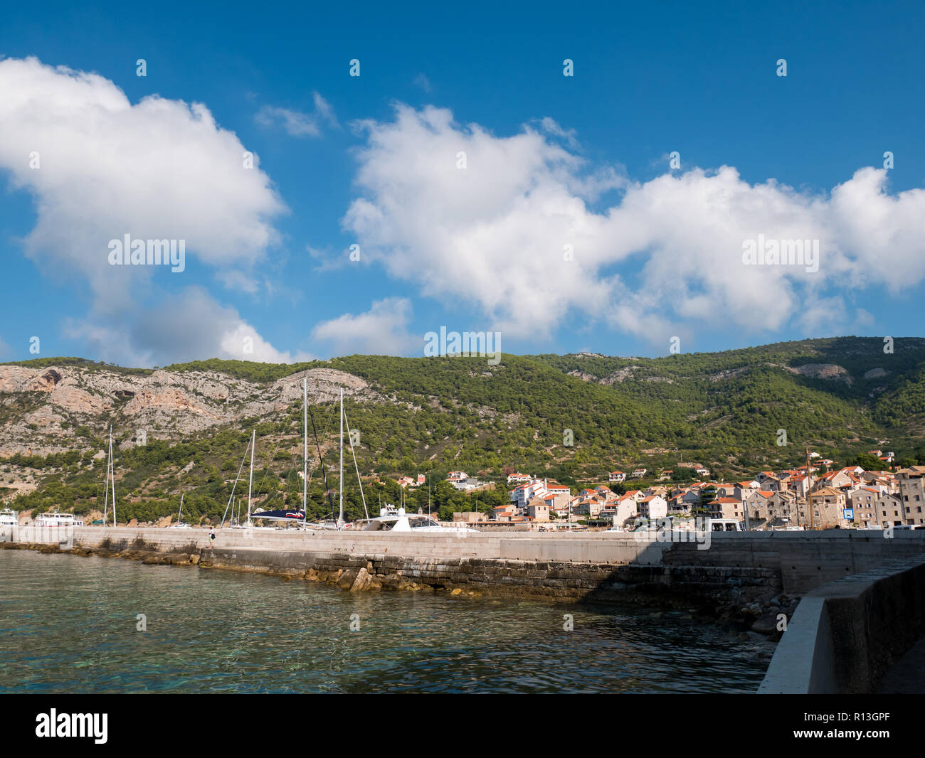 Komiza city on island Vis harbor waterfront Stock Photo - Alamy