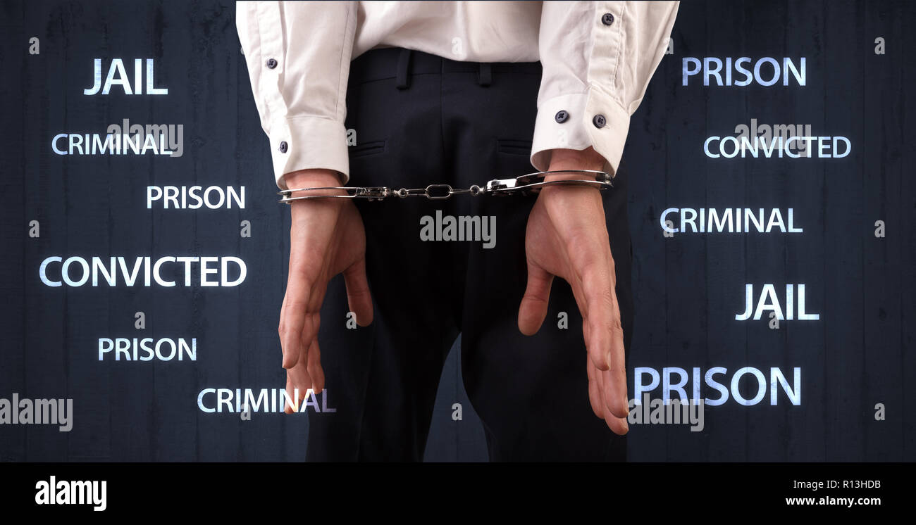 Jail convicted prison criminal labels with close handcuffed man Stock ...