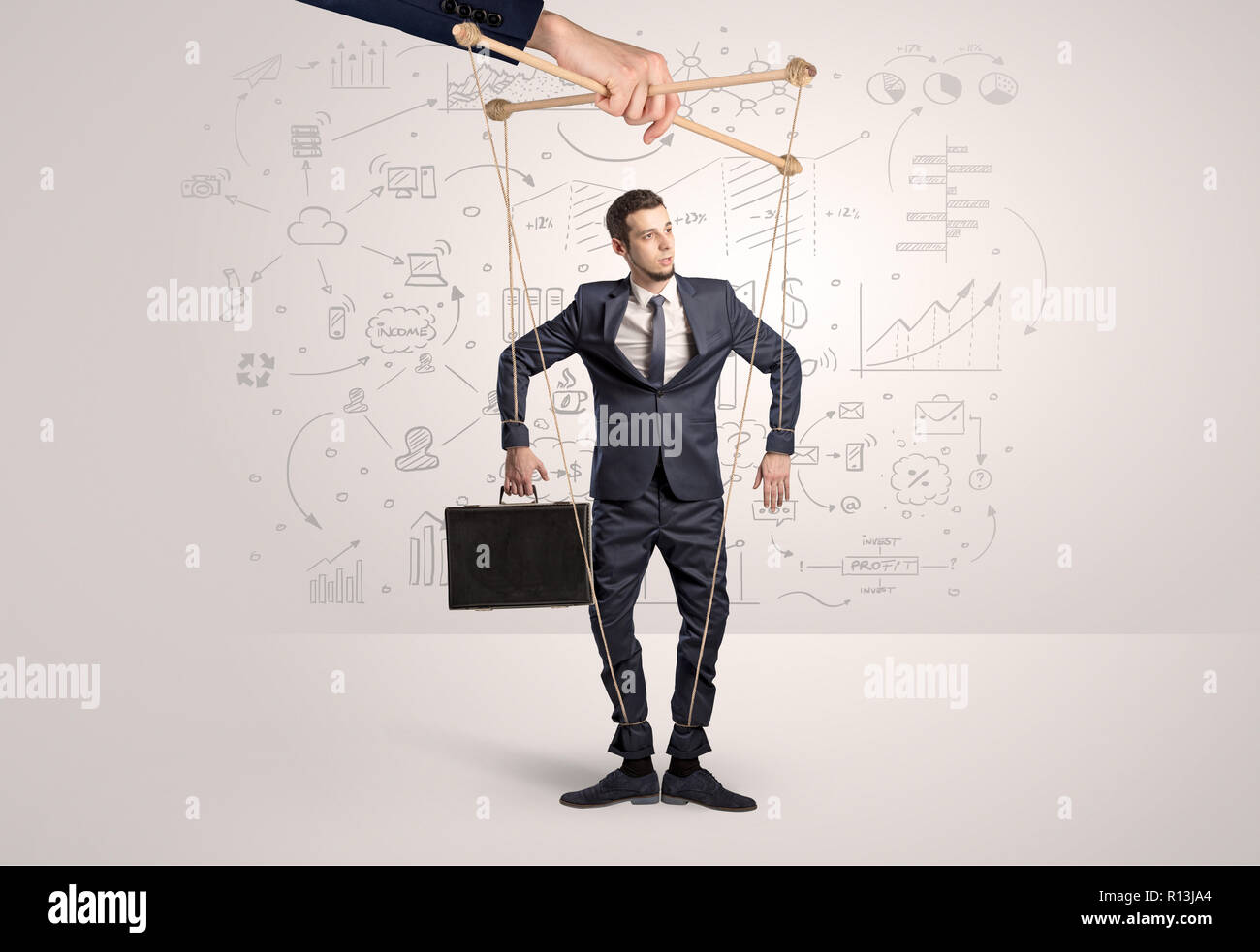 Little businessman controlled from above like a puppet concept Stock ...