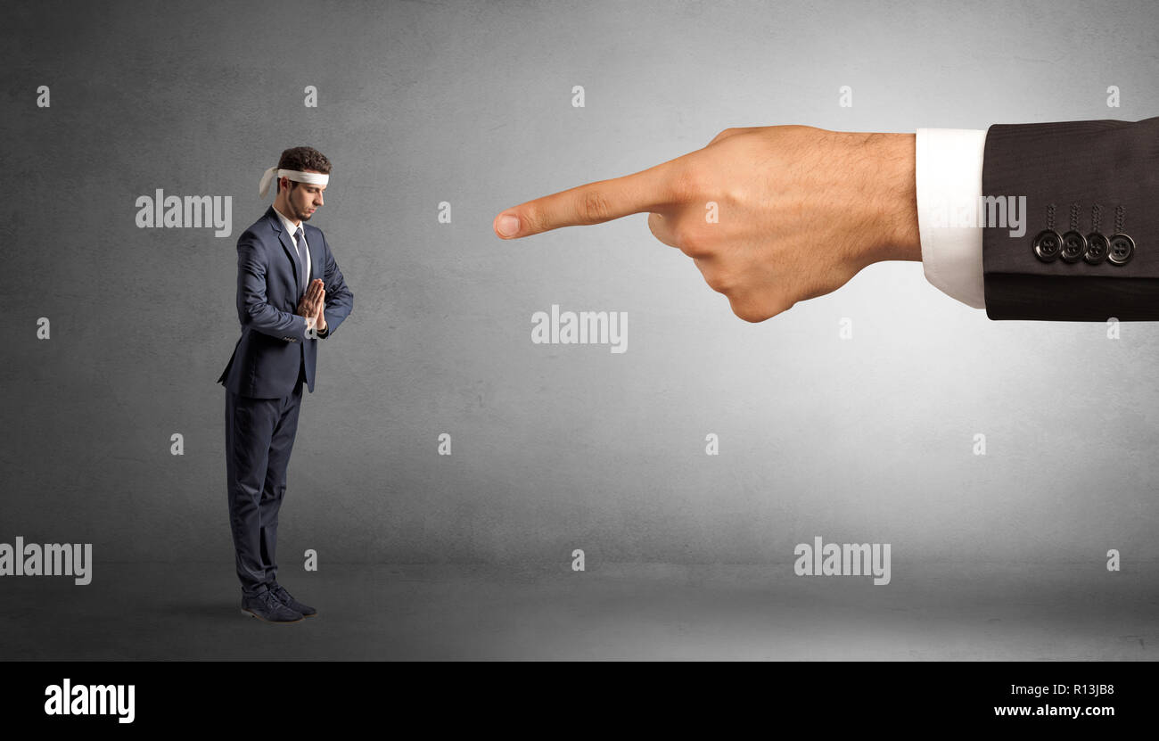 Small karate man fighting with big hand Stock Photo - Alamy