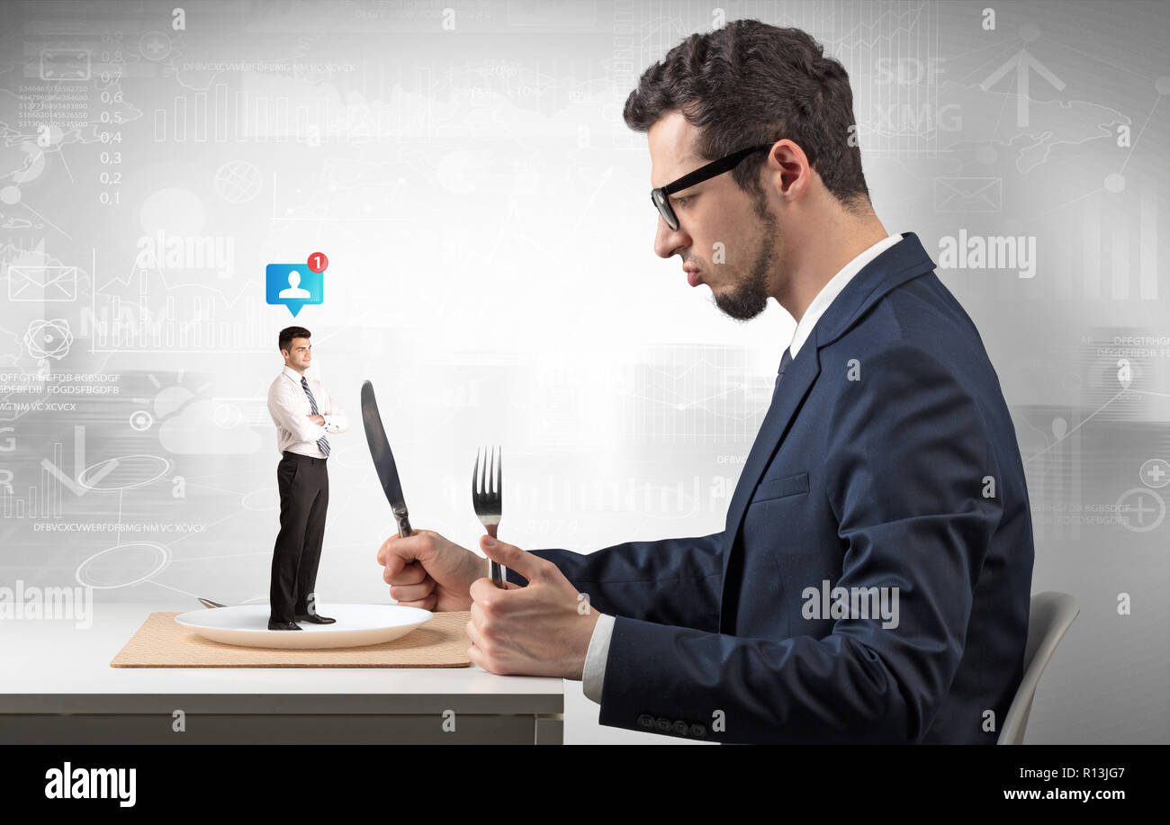Giant businessman eating small man with financial background Stock ...