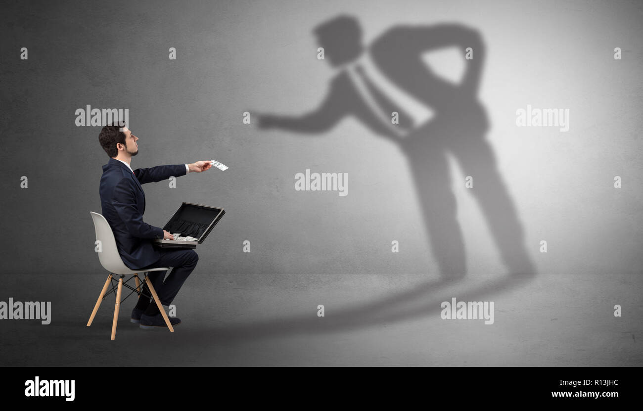 Businessman staying and offering stuffs to a shadow businessman Stock ...