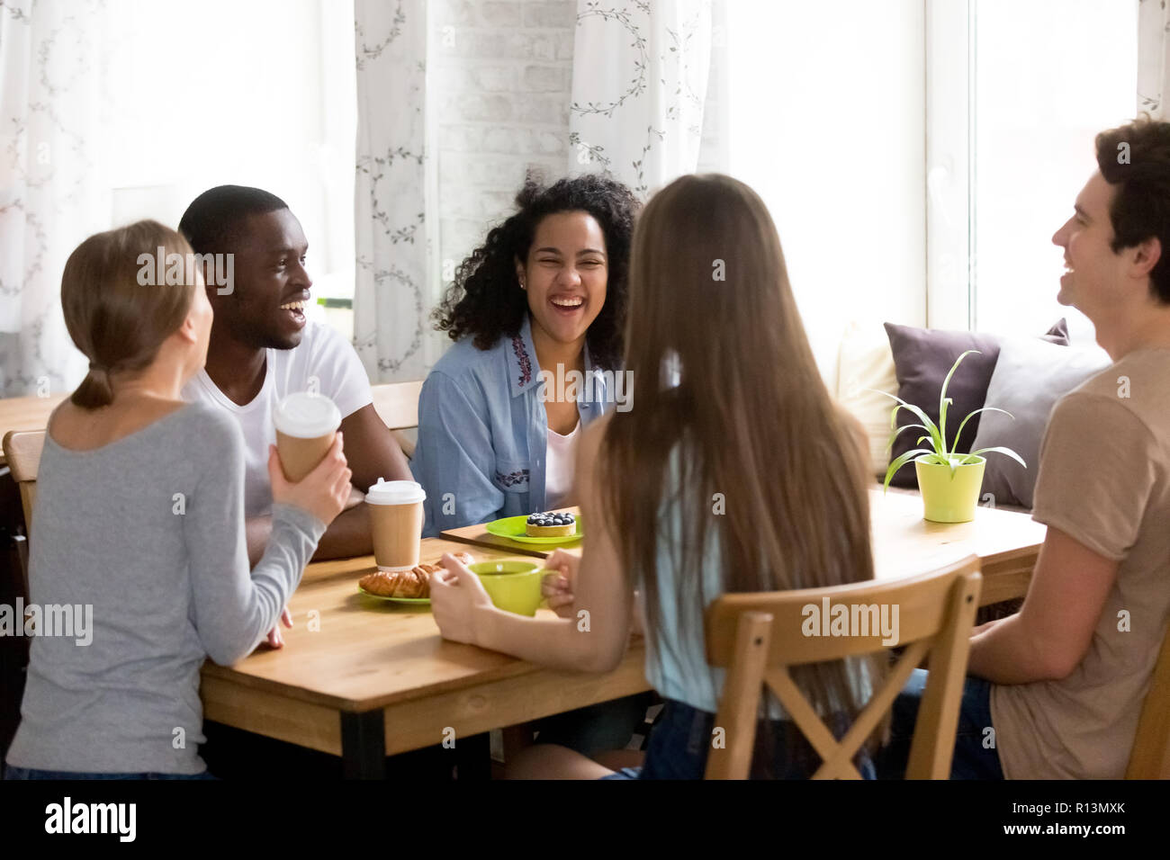 Diverse group drinking tea hi-res stock photography and images - Alamy