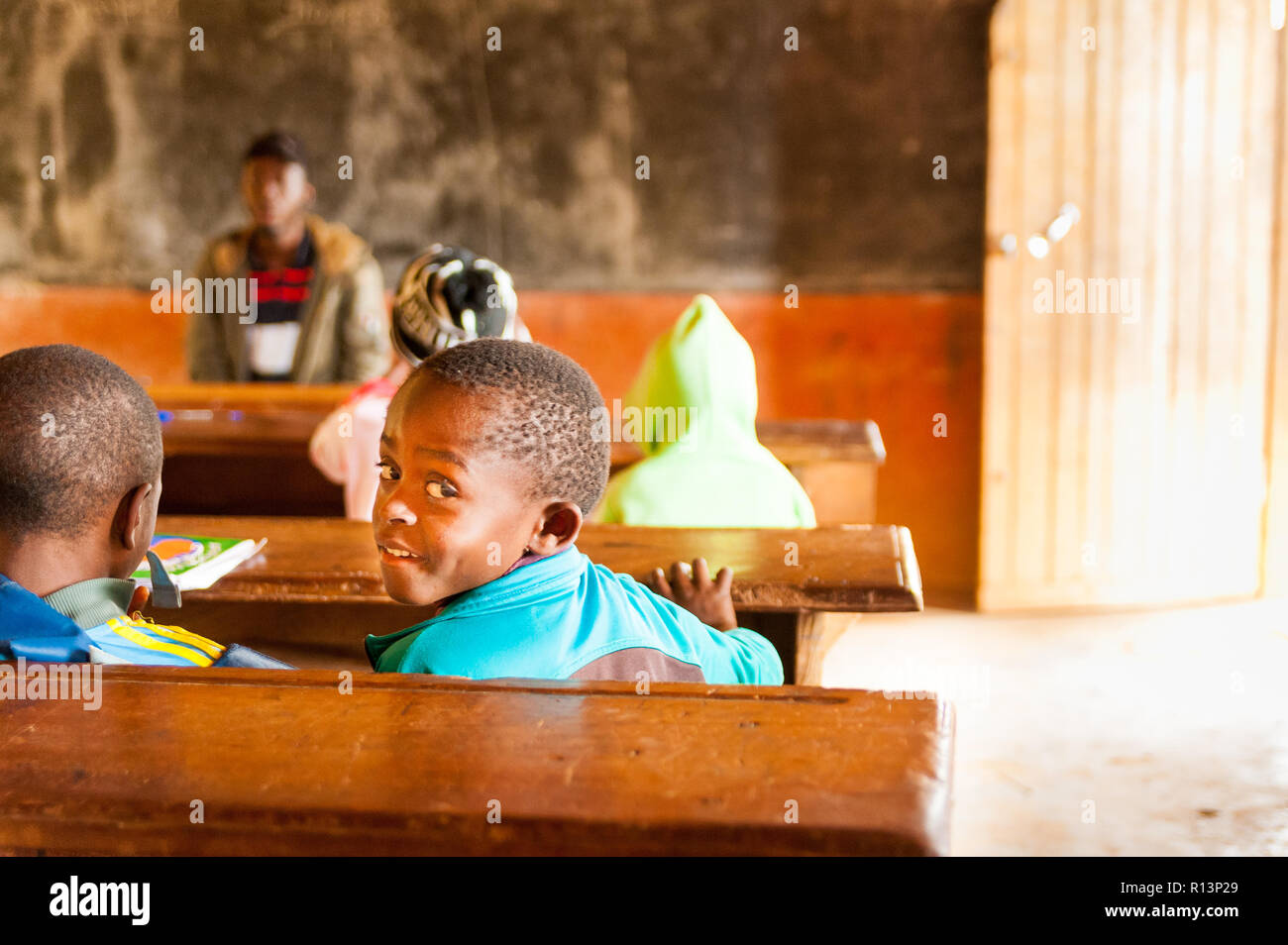 Bafoussam, Cameroon - 06 august 2018: smiling african child looking in ...