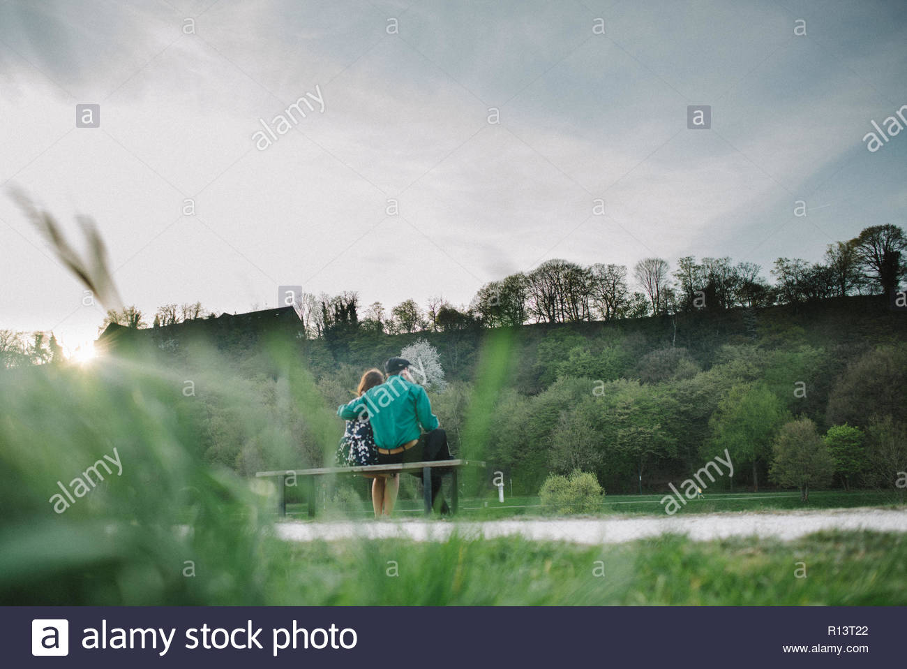 Two Men Man Sitting On A Bench Stock Photos & Two Men Man Sitting On A ...