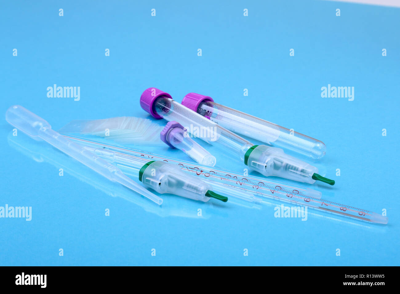 Set of laboratory supplies for blood test. Petri dish, scarifier ...