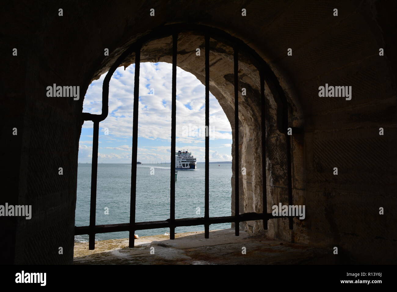 isle of wight ferry through the bars of round tower arched window Stock ...