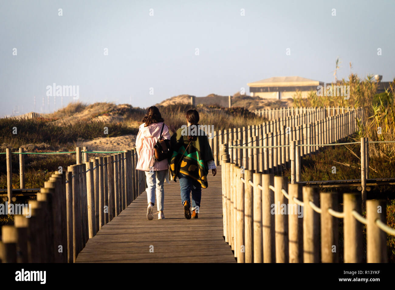 Back view two women outside walking hi-res stock photography and images ...