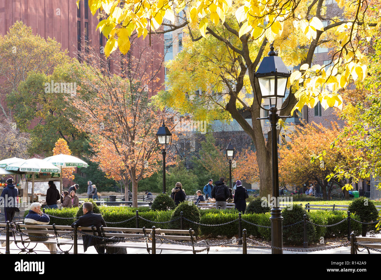 People Enjoying a Sunny Fall Day in Washington Square Park, NYC Stock ...