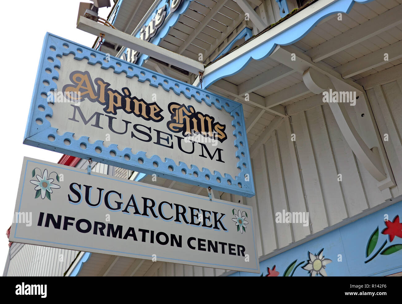 Alpine Hills Museum and Sugarcreek Information Center signs hang ...