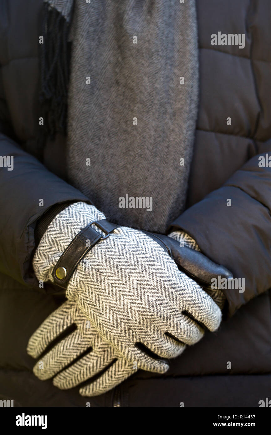 The man folded his gloves Stock Photo - Alamy