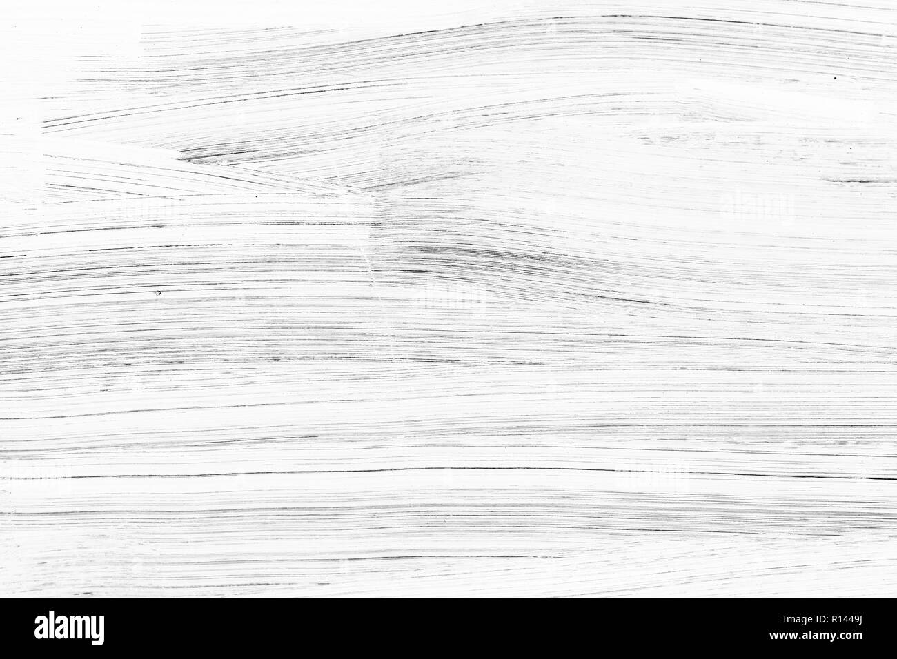 White wooden wall with rough horizontal paint brush strokes pattern, frontal background texture ...