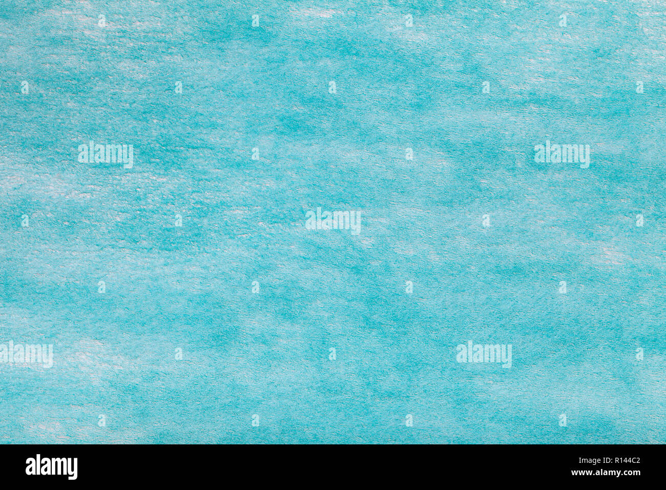 Construction of a light blue background with white spots of felt fabric ...