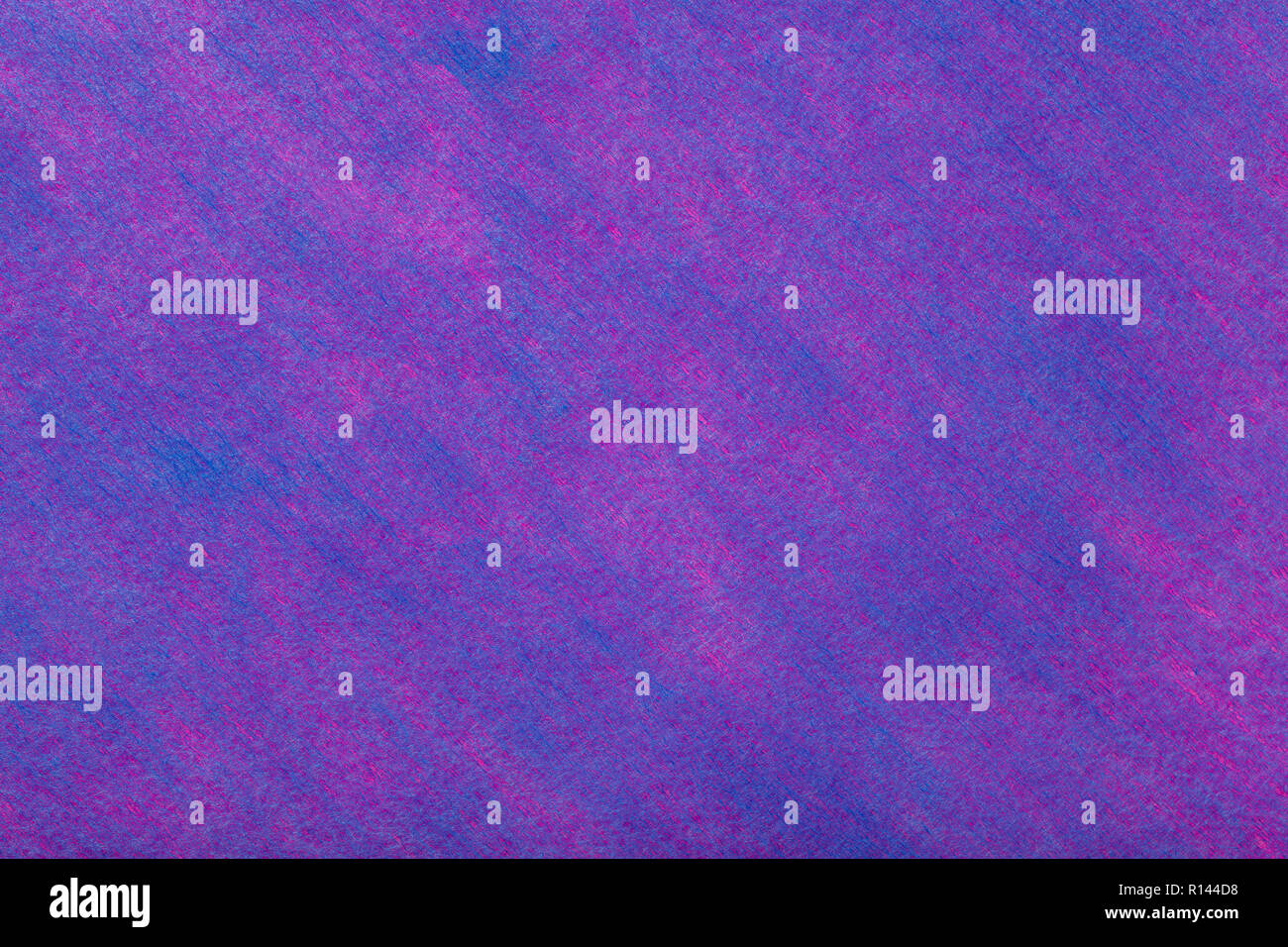 Construction of a bright purple background with navy blue spots of felt ...