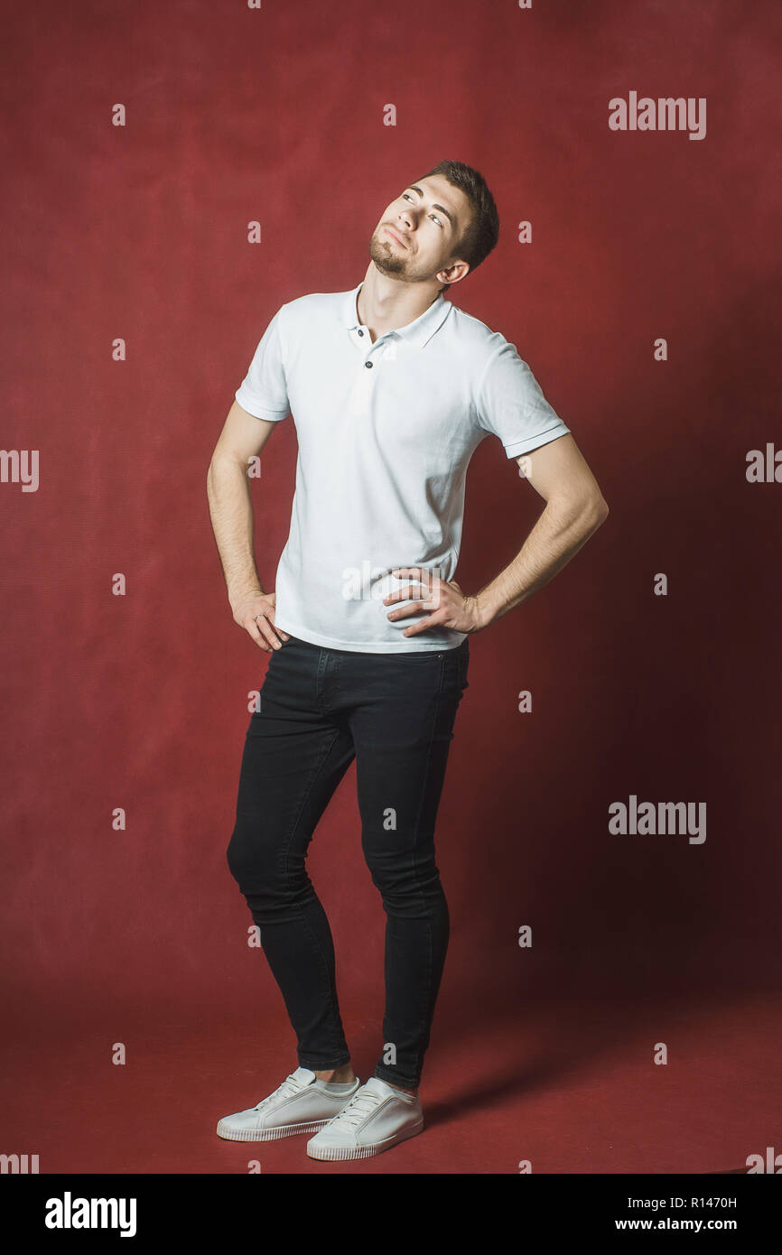 Portrait of a Happy Chinese man standing against red background Stock ...