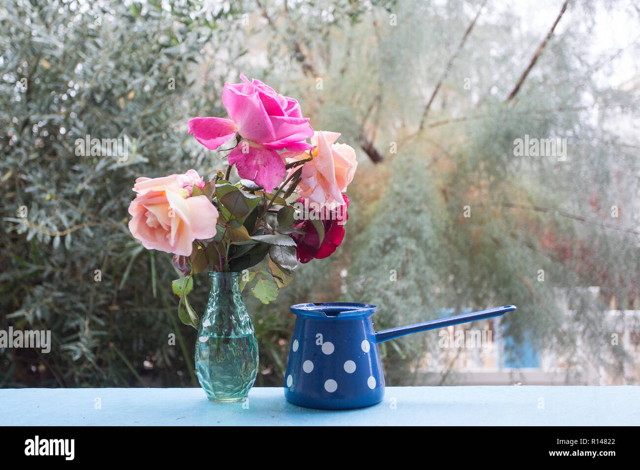 Bouquet of roses on the terrace hi-res stock photography and images - Alamy