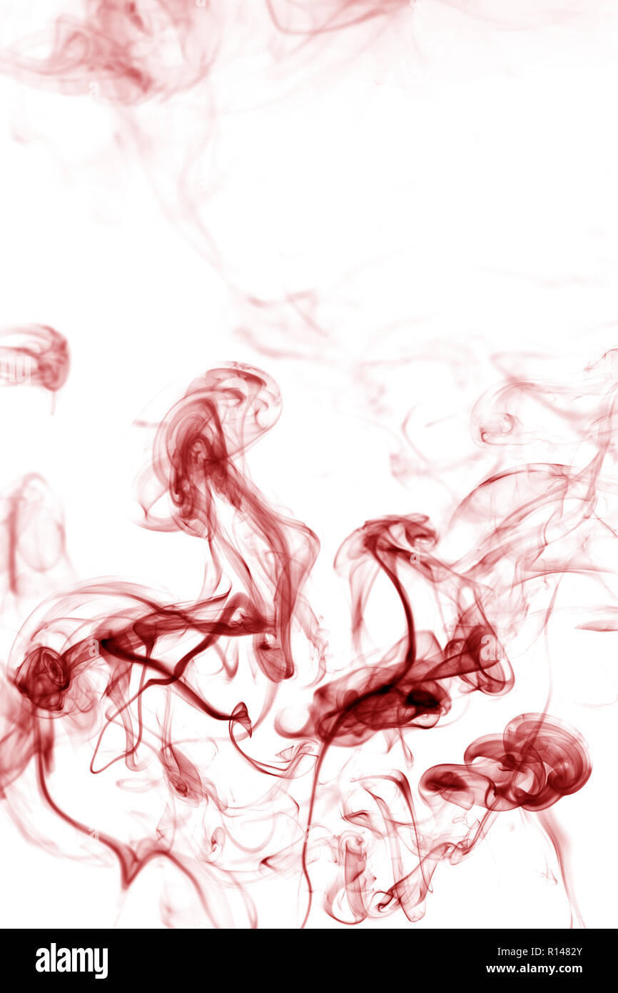 Red smoke movement on a white background Stock Photo - Alamy