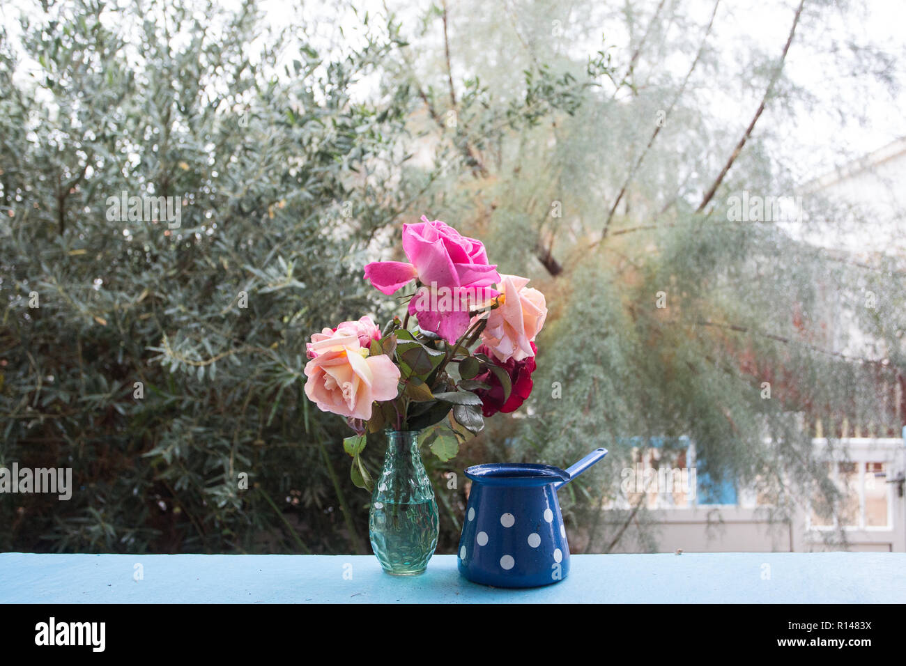 Bouquet of roses on the terrace hi-res stock photography and images - Alamy