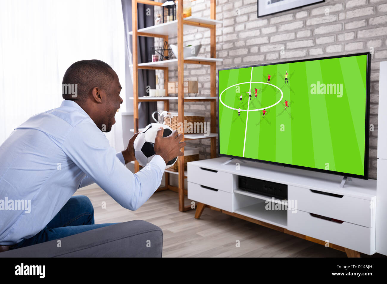 African american soccer fan hi-res stock photography and images - Alamy