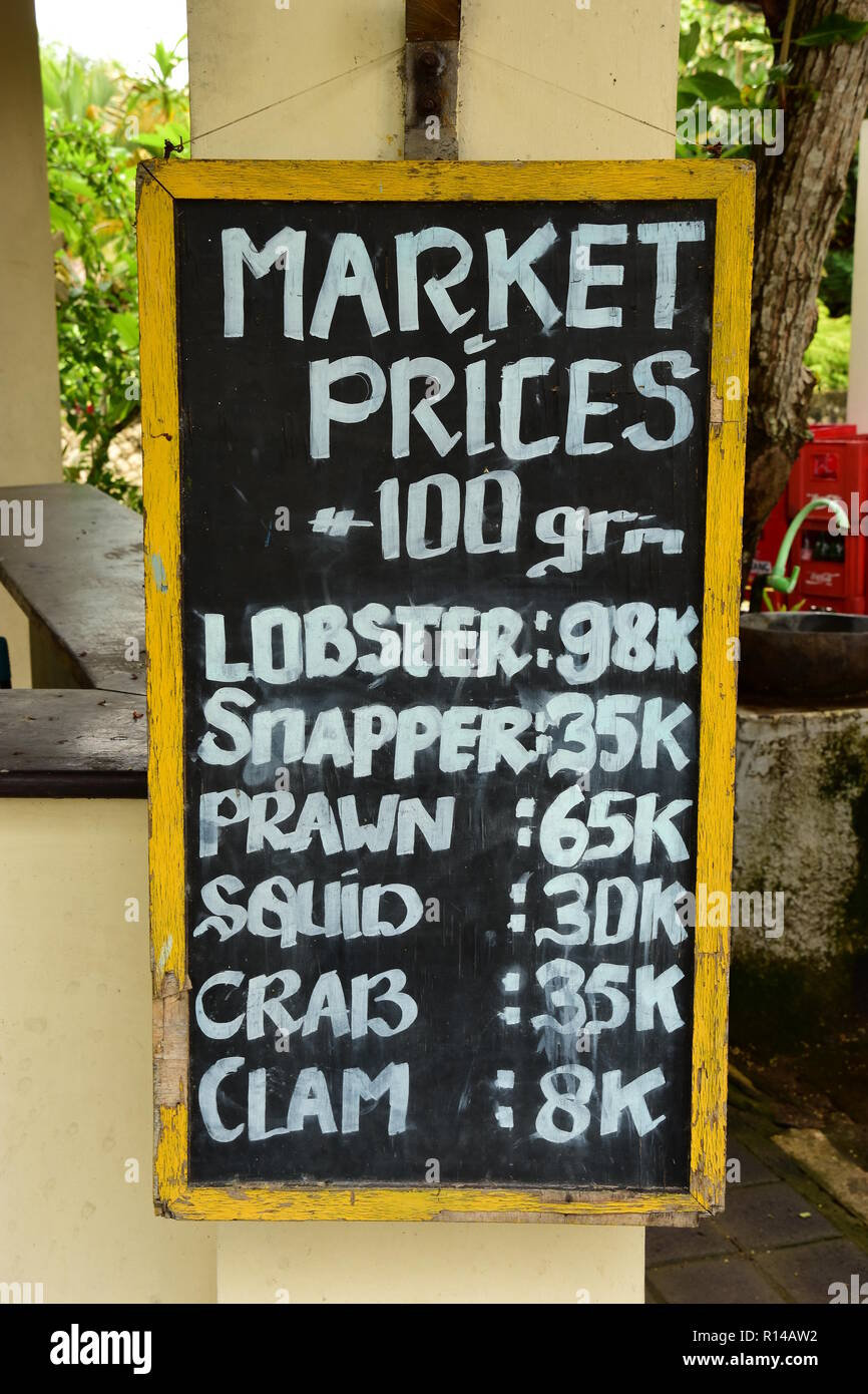 Seafood market price sign, Bali Stock Photo - Alamy