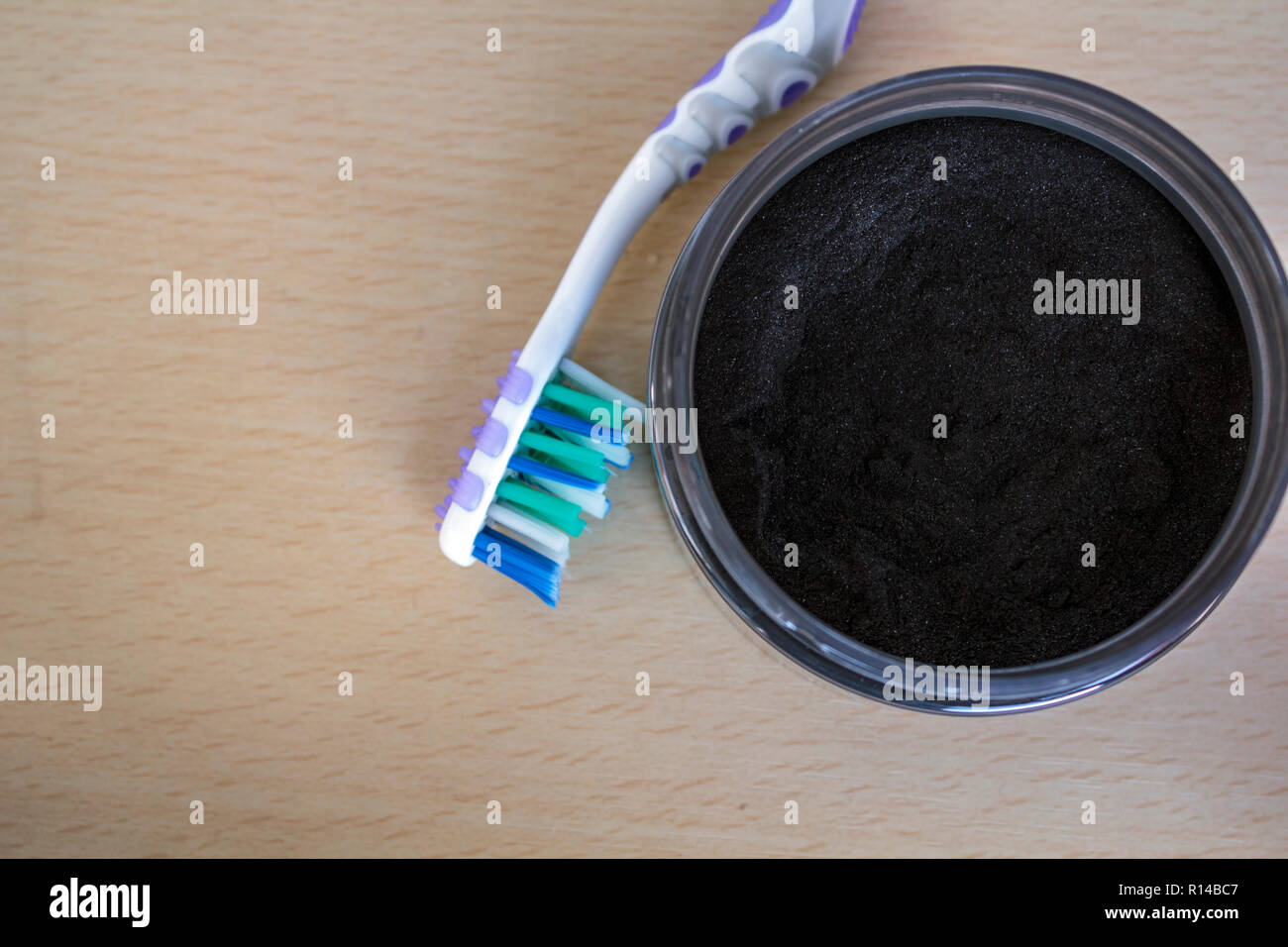 Black activated carbon toothpaste hi-res stock photography and images ...