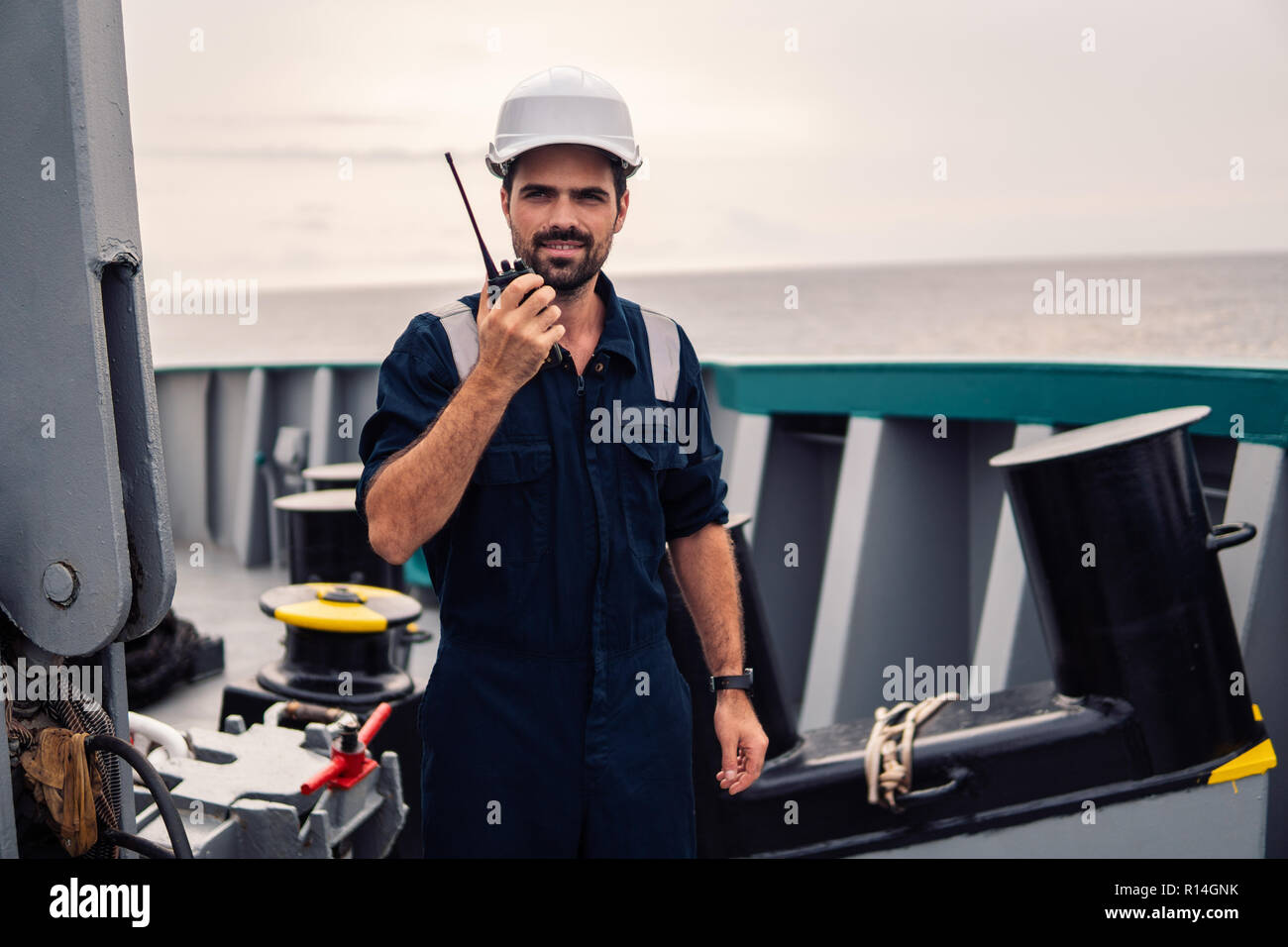 Marine Deck Officer or Chief mate on deck of vessel or ship . He holds ...