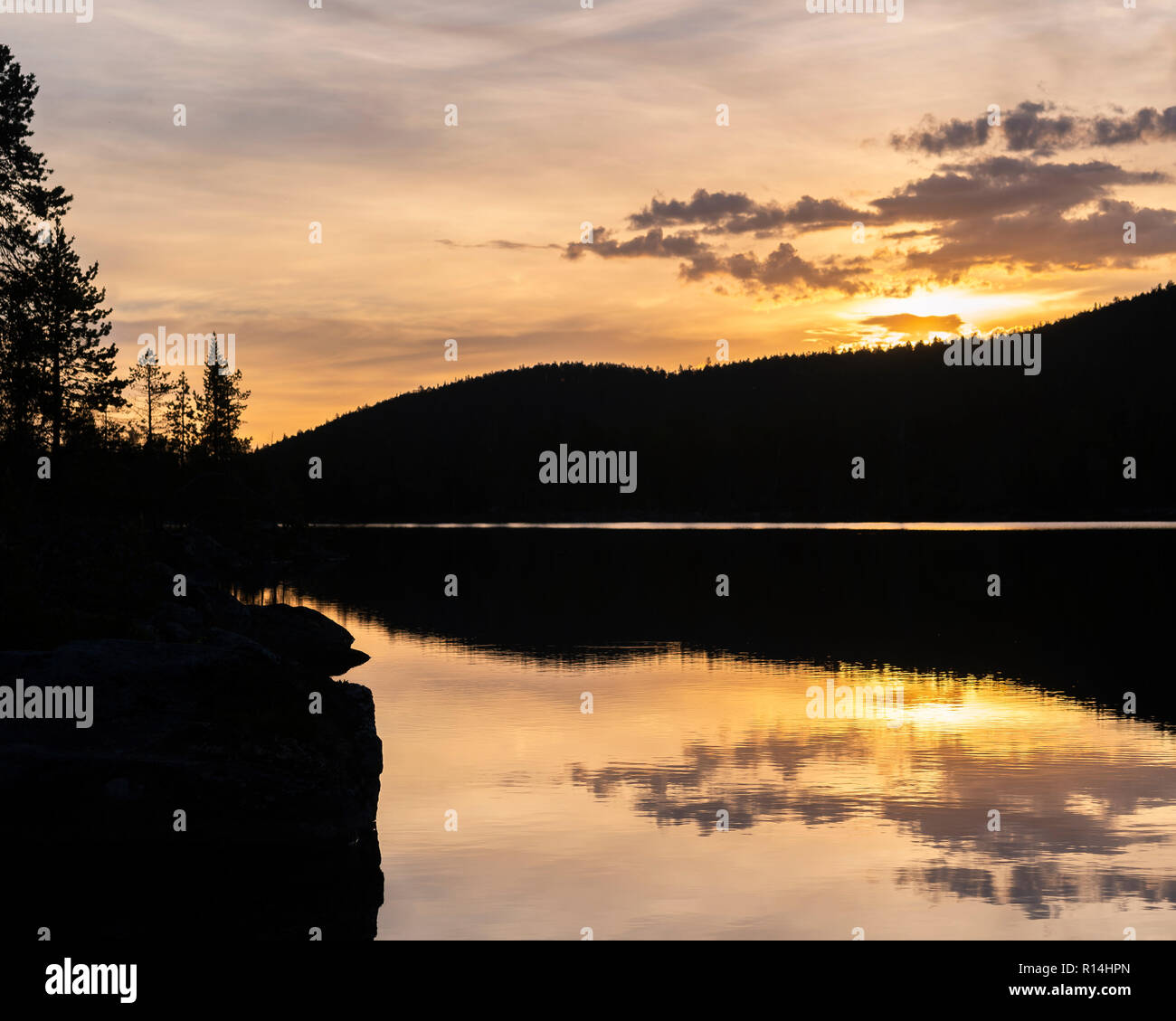 Sunset at lake Inari Lapland Finland Stock Photo - Alamy