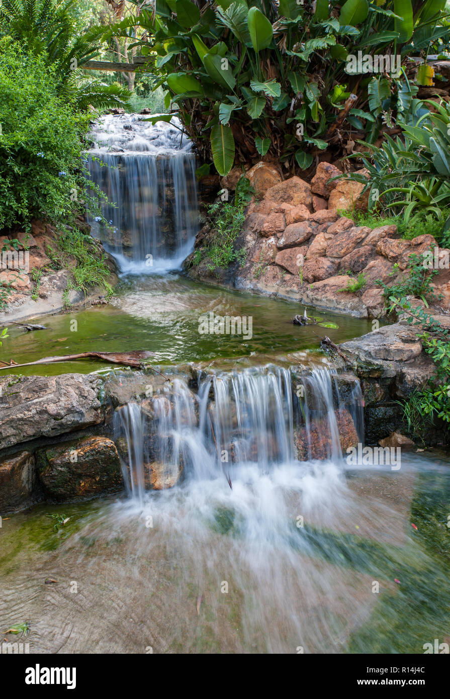 Small waterfall in a tranquil public park, Pretoria, South Africa Stock ...