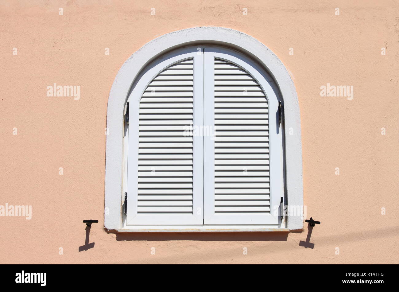 Italian style window with closed shutters Stock Photo - Alamy