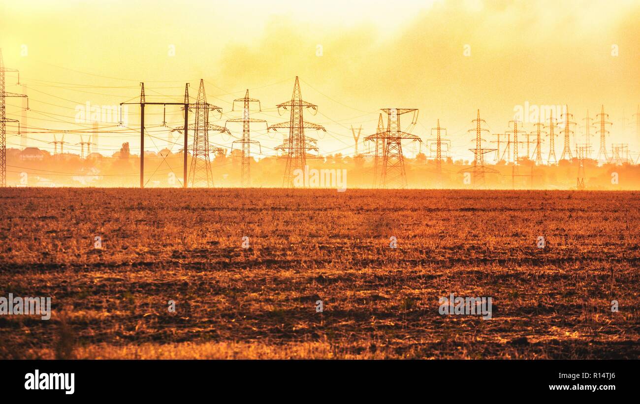view of the power lines at sunset Stock Photo - Alamy