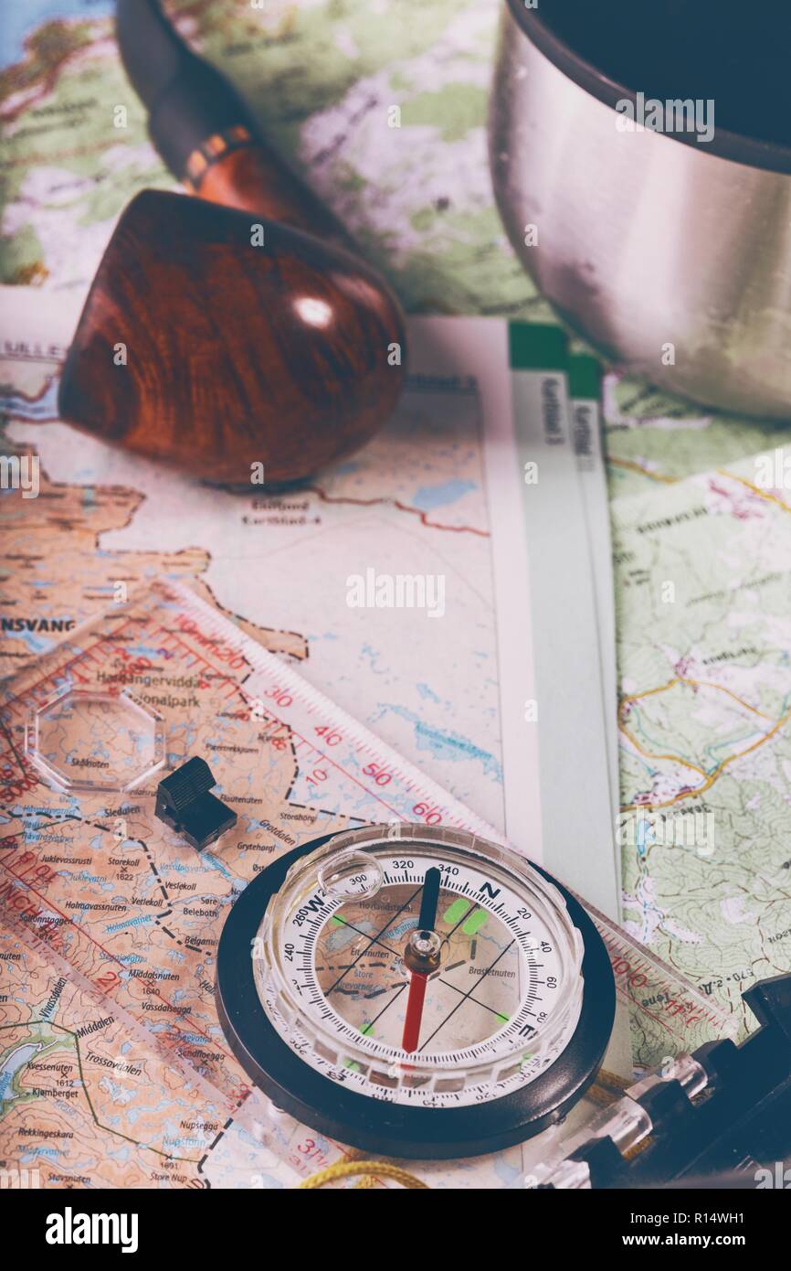 retro style abstract shoot with the compass on a map Stock Photo - Alamy