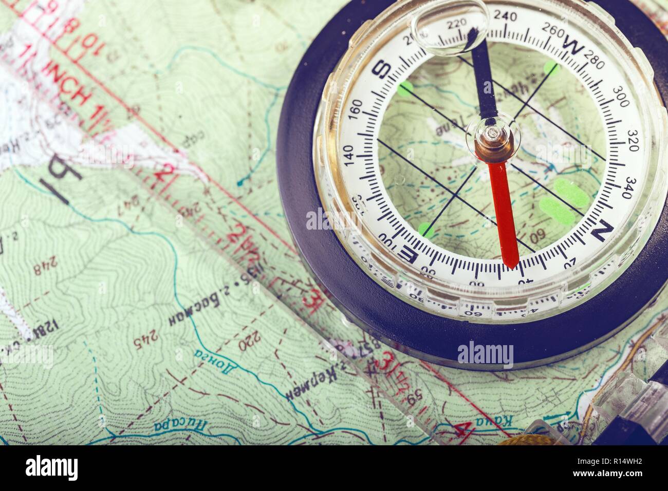 retro style abstract shoot with the compass on a map Stock Photo - Alamy