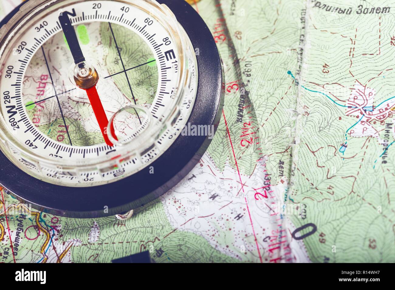retro style abstract shoot with the compass on a map Stock Photo - Alamy