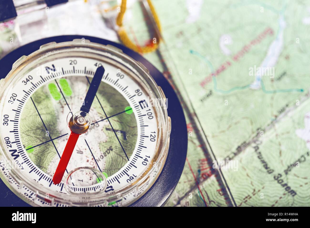 retro style abstract shoot with the compass on a map Stock Photo - Alamy