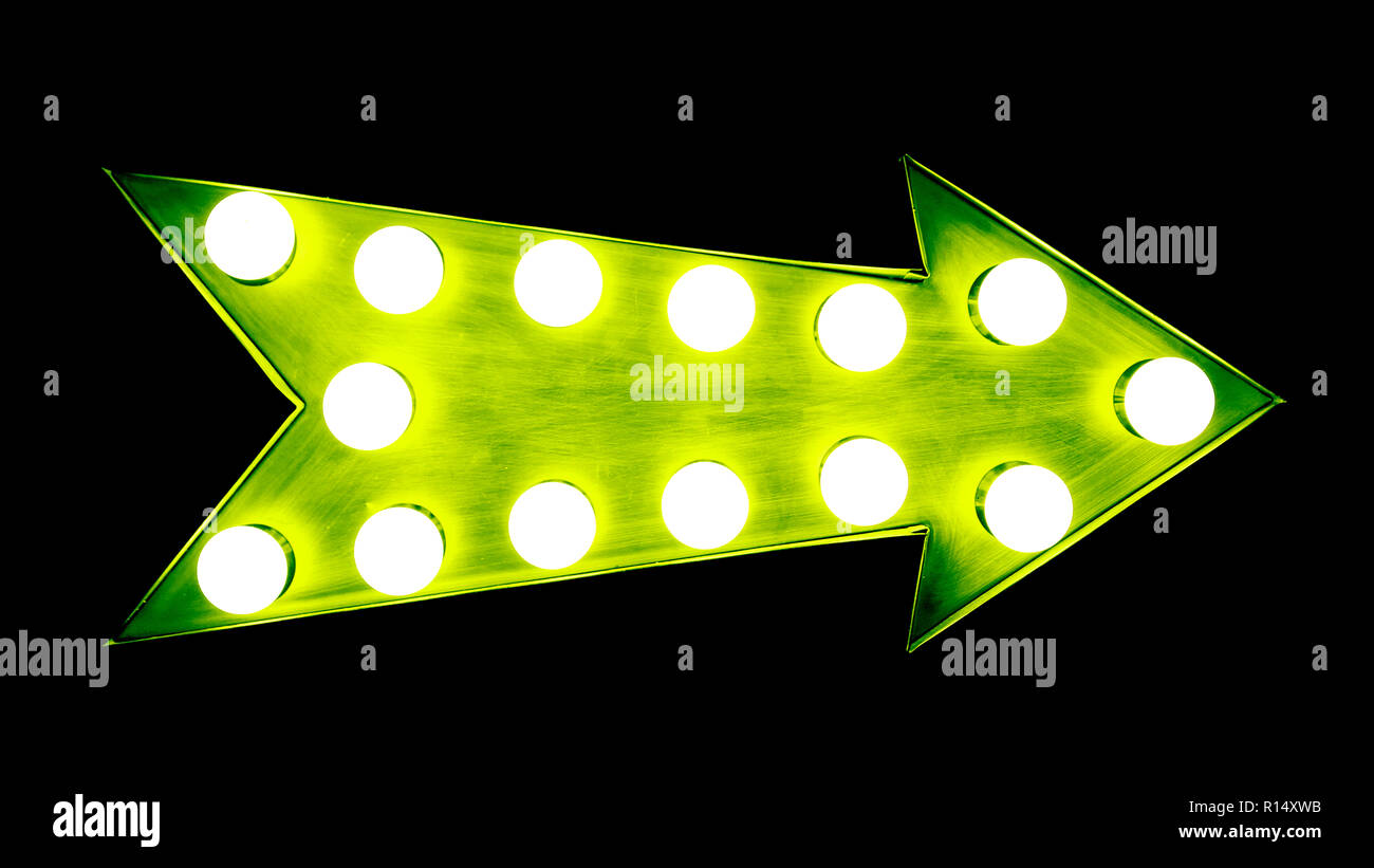 Green vintage bright and colorful illuminated metallic display arrow ...