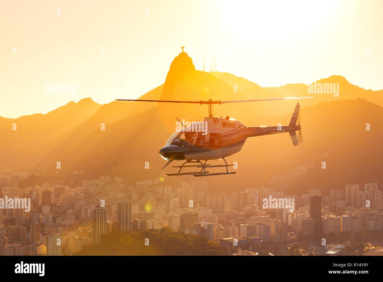 helicopter flying over Rio de Janeiro at the evening light. Brazil ...