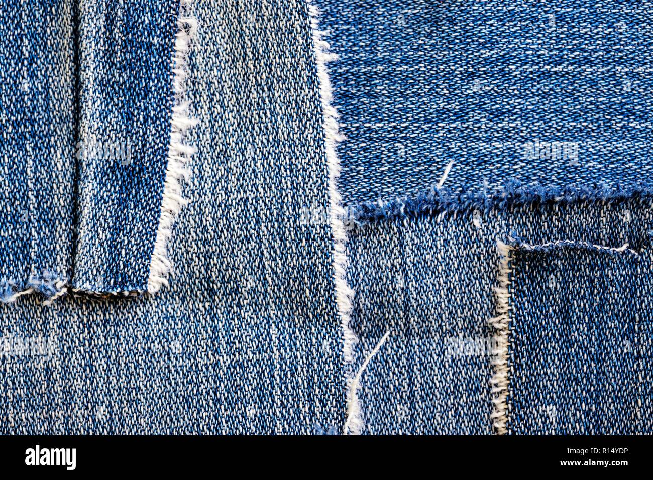 background made of old jeans rags close up Stock Photo - Alamy