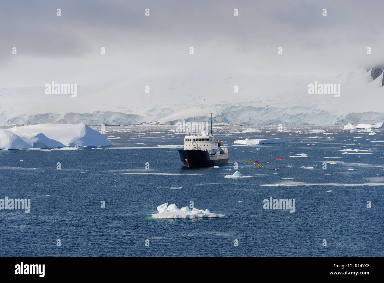 Antarctic landscape with expedition ship Stock Photo - Alamy
