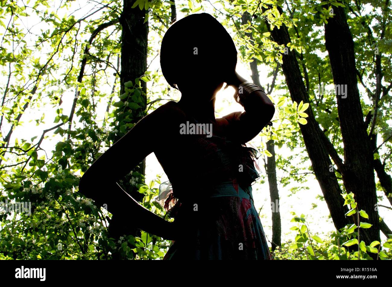Asian female model poses for pictures in the nature Stock Photo - Alamy