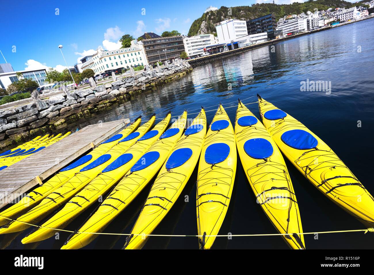 water sports - group of kayaks in alesund, Norway Stock Photo - Alamy