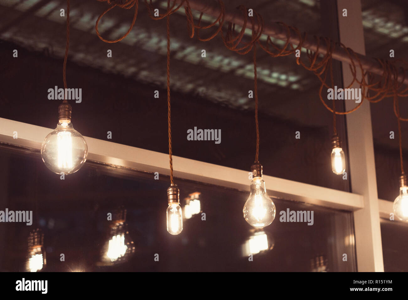 Set of retro lamps in coffee shop Stock Photo - Alamy