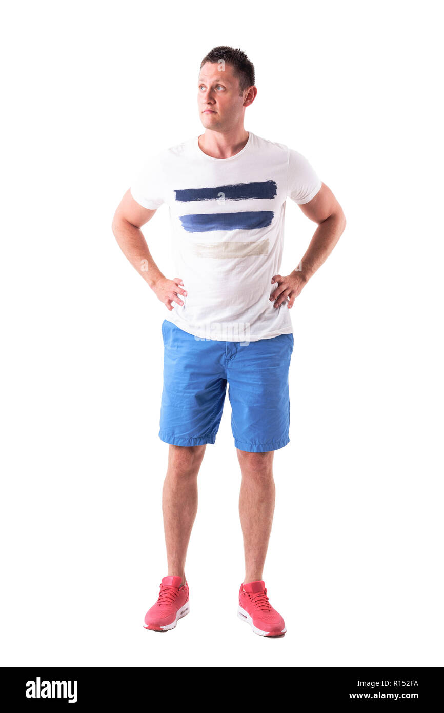 Thoughtful man in summer clothes looking up. Full body isolated on ...