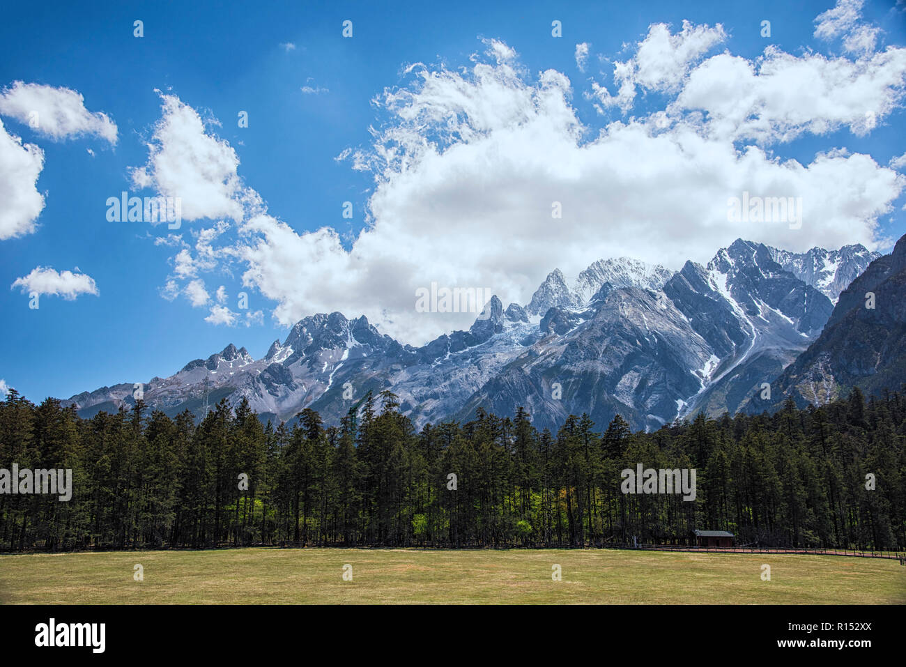 Snow covered Jade Dragon Mountains situated in the Yunnan Province of ...