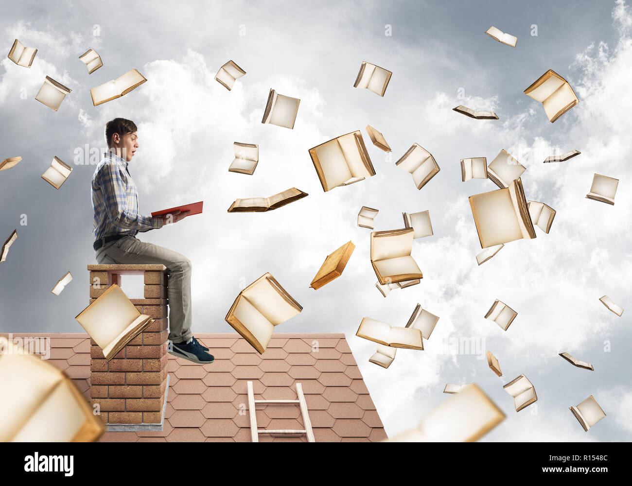 Man reading book and many of them flying in air Stock Photo - Alamy